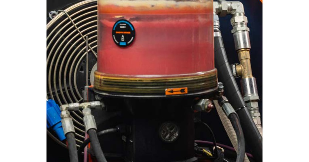 Automatic greasing system for tunneling drills